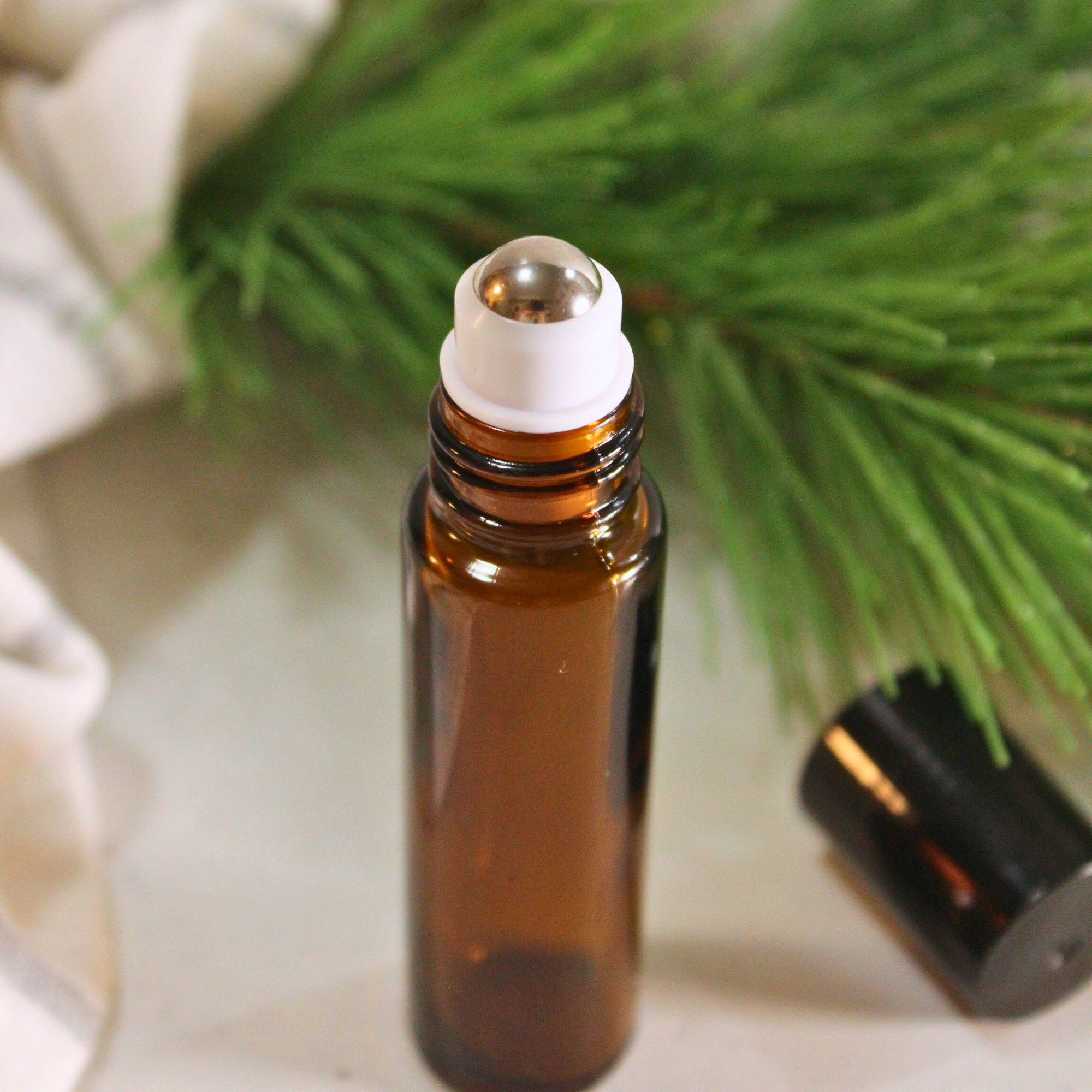 DIY Pine Roll-On (Essential Oil Perfume) - The Coconut Mama
